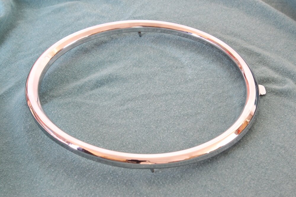 Chrome ring on headlight surround in grille right/left NOS Alfetta 1.