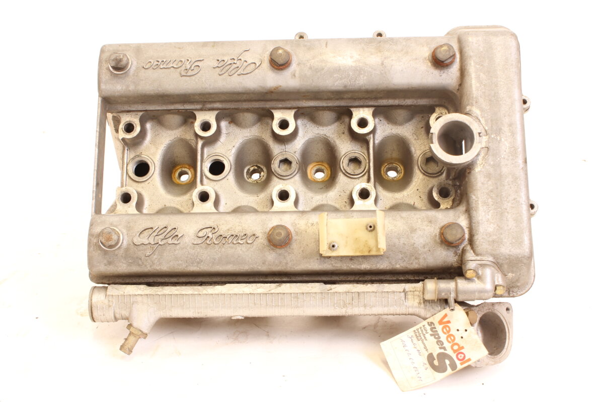 Cylinder head empty without valves and camshaft with valve cover Alfa